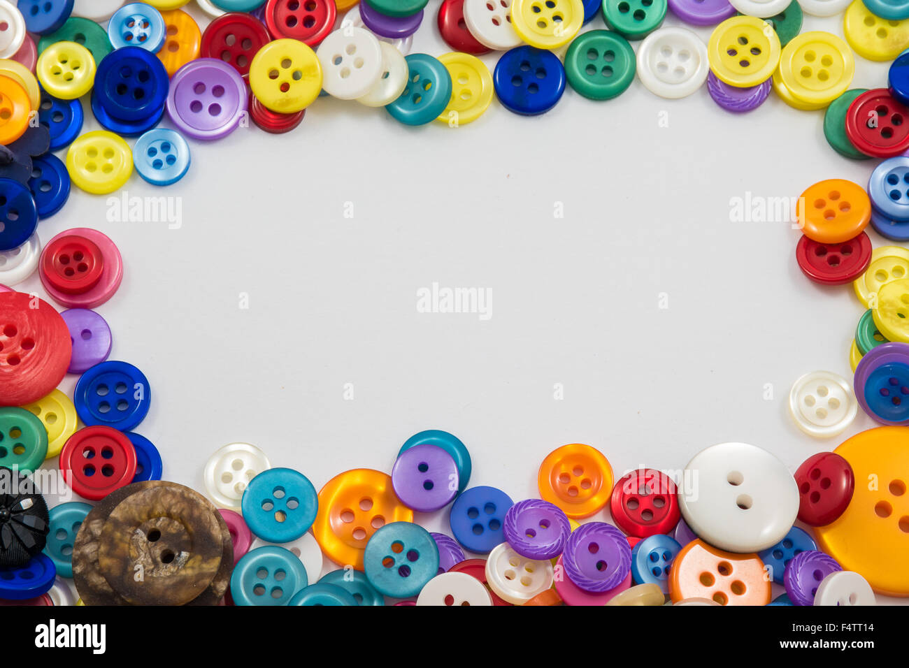 Assorted Buttons forming a rough shape background with copyspace Stock ...