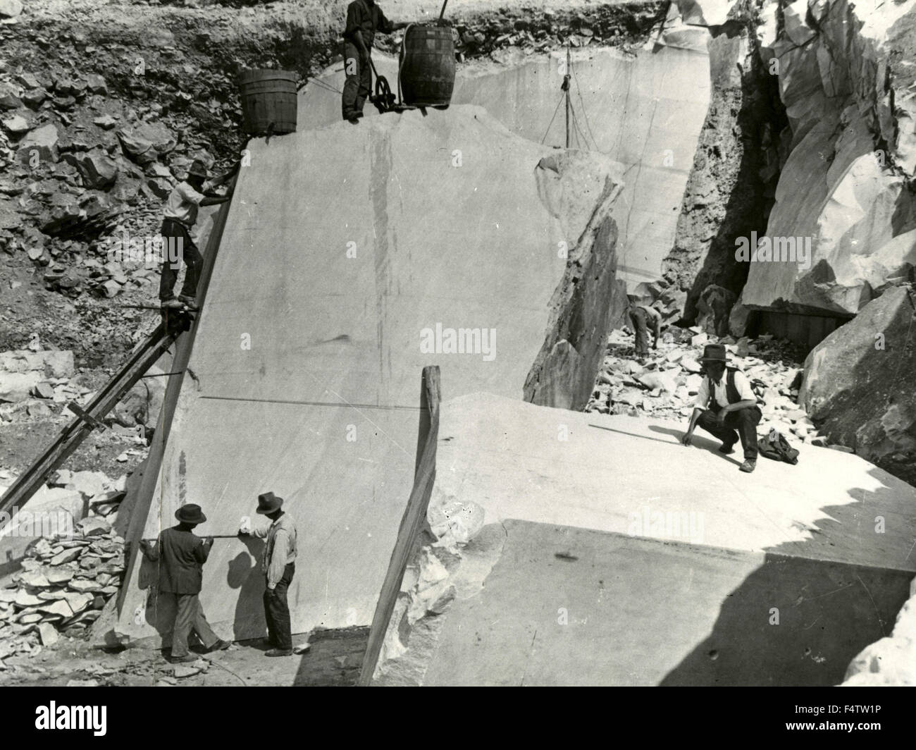 A group of workers working in a marble quarry in Carrara, Italy Stock ...