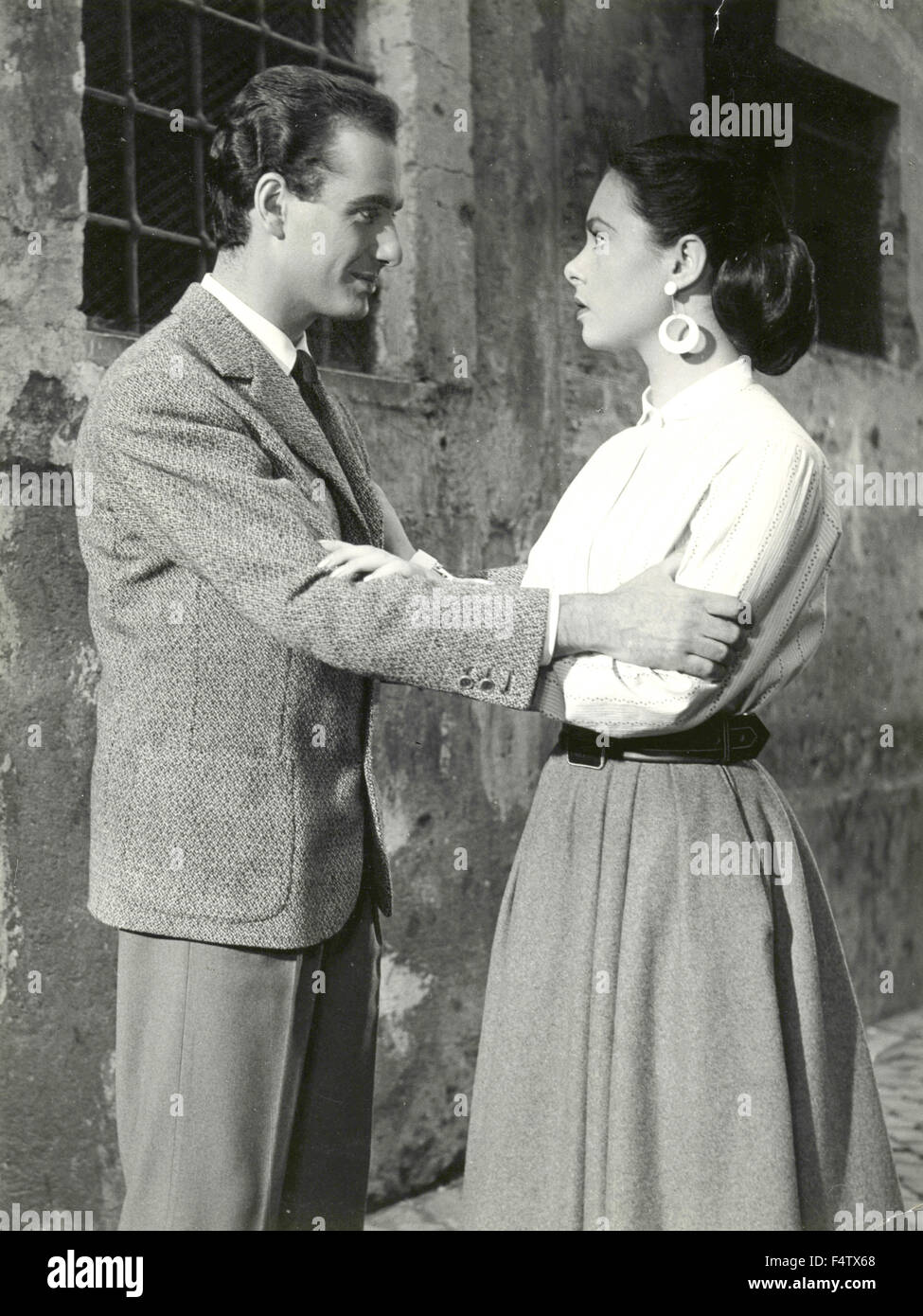 Pair of Italian actors in a scene from a movie Stock Photo - Alamy