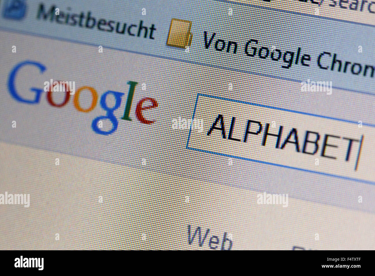 An illustration shows the term 'Alphabet' on a screen displaying the ...
