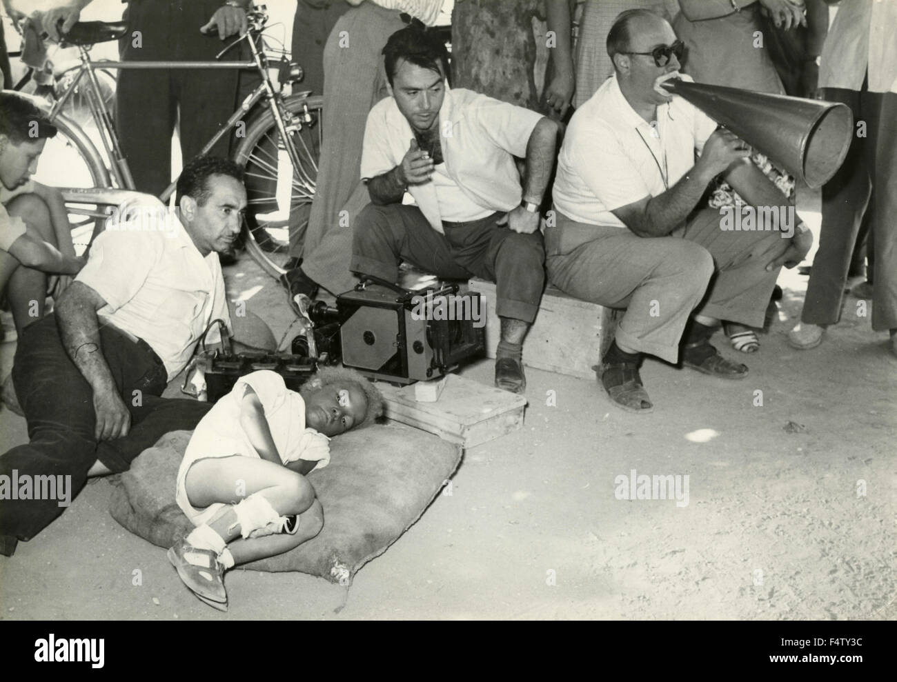 On the set of the movie "Angelo tra la folla" the child actor Angelo ...