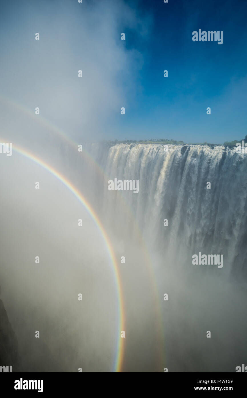Victoria Falls, Zimbabwe - Victoria Falls Waterfall with rainbow Stock ...