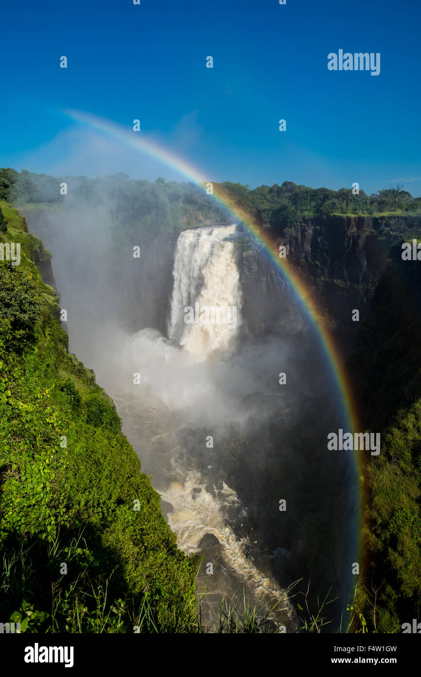 Victoria Falls, Zimbabwe - Victoria Falls Waterfall with rainbow Stock ...