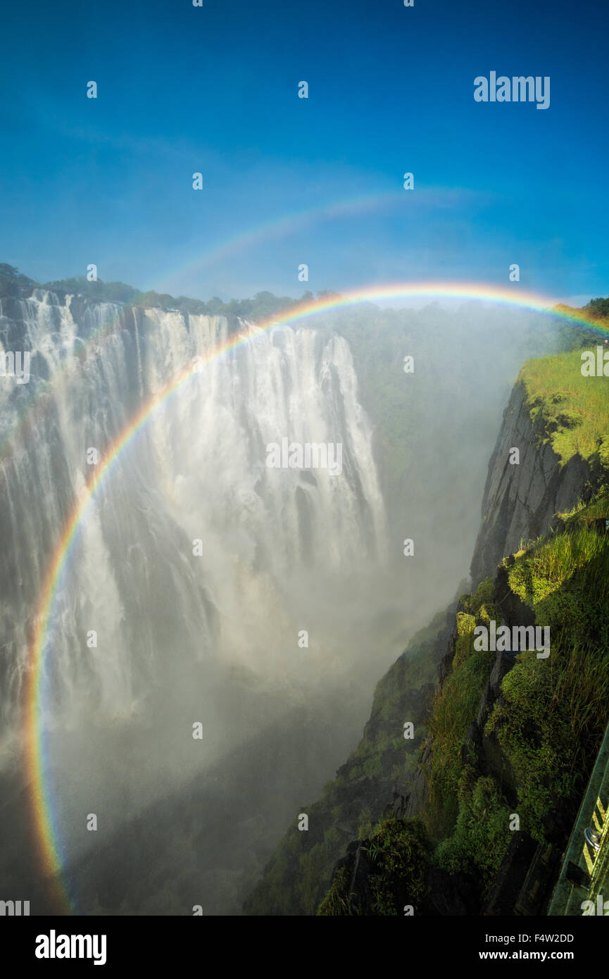 LIVINGSTONE, ZAMBIA - Victoria Falls Waterfall with rainbow Stock Photo ...