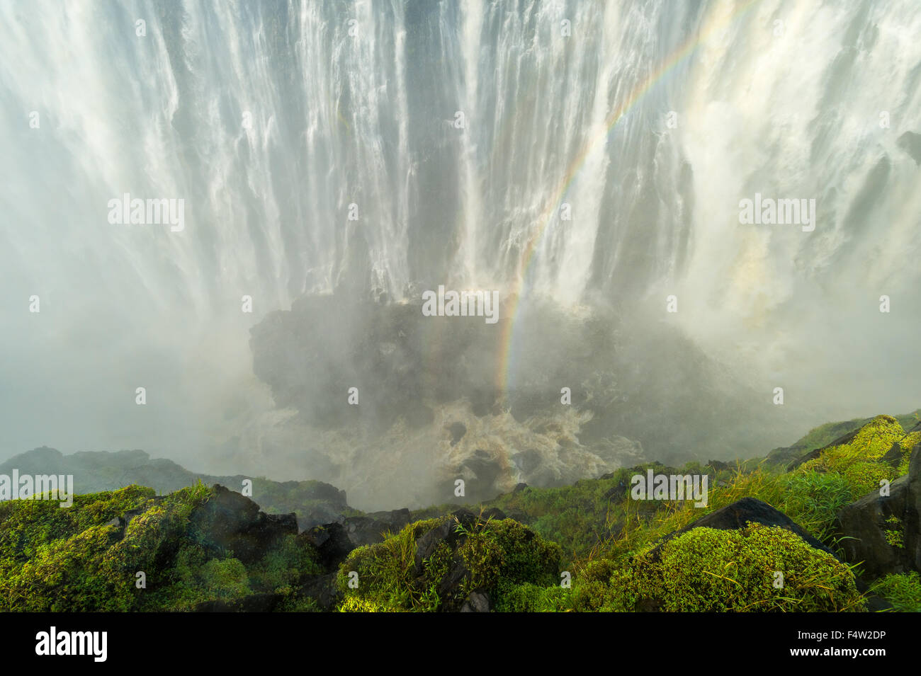 LIVINGSTONE, ZAMBIA - Victoria Falls Waterfall with rainbow Stock Photo ...
