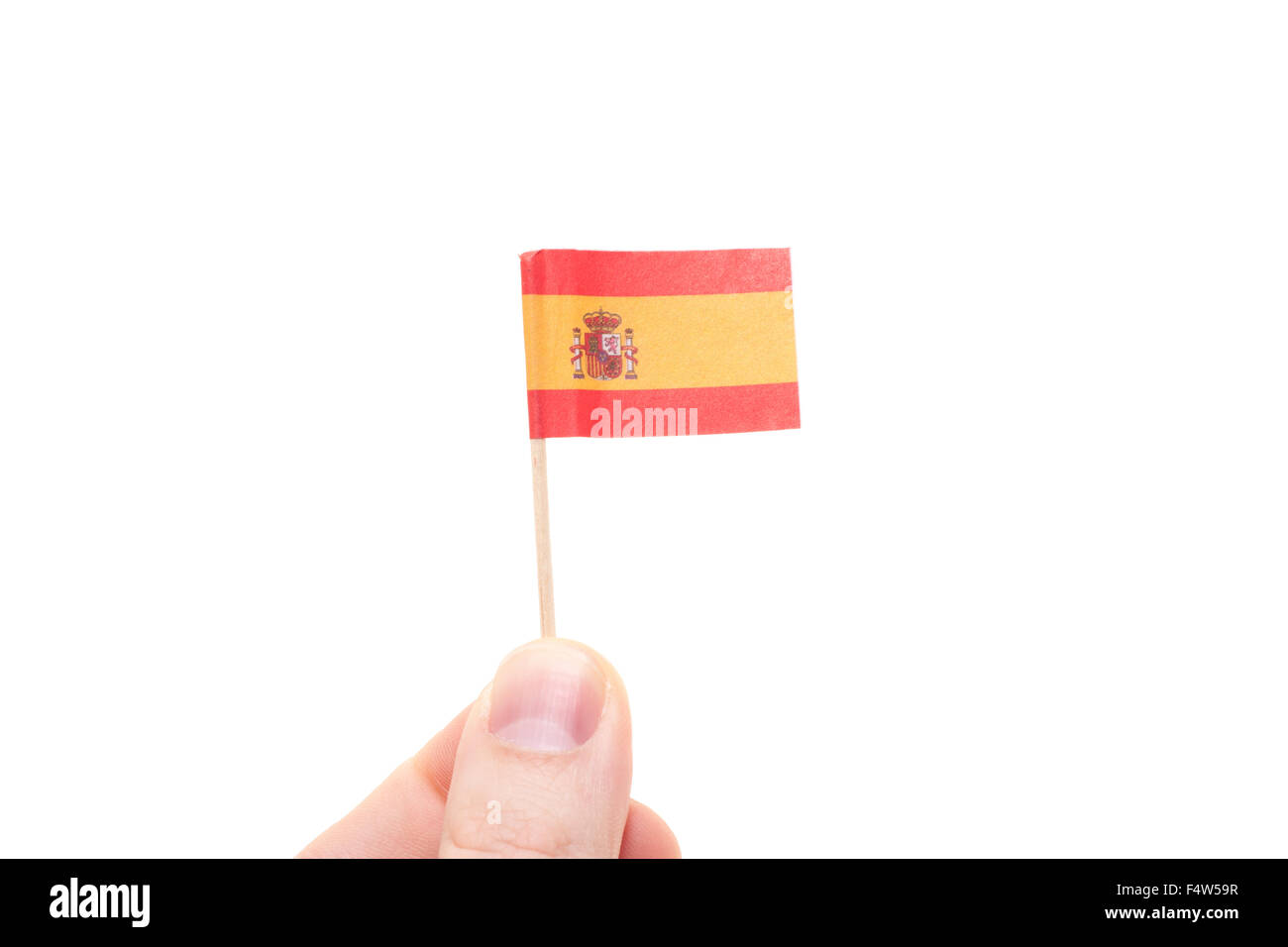 Hand holding spanish flag. All on white background Stock Photo - Alamy