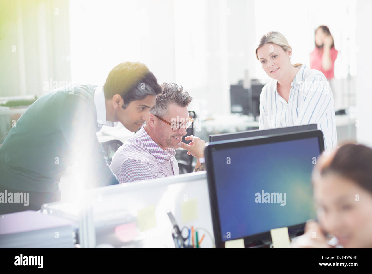 Business people working at computer in office Stock Photo - Alamy