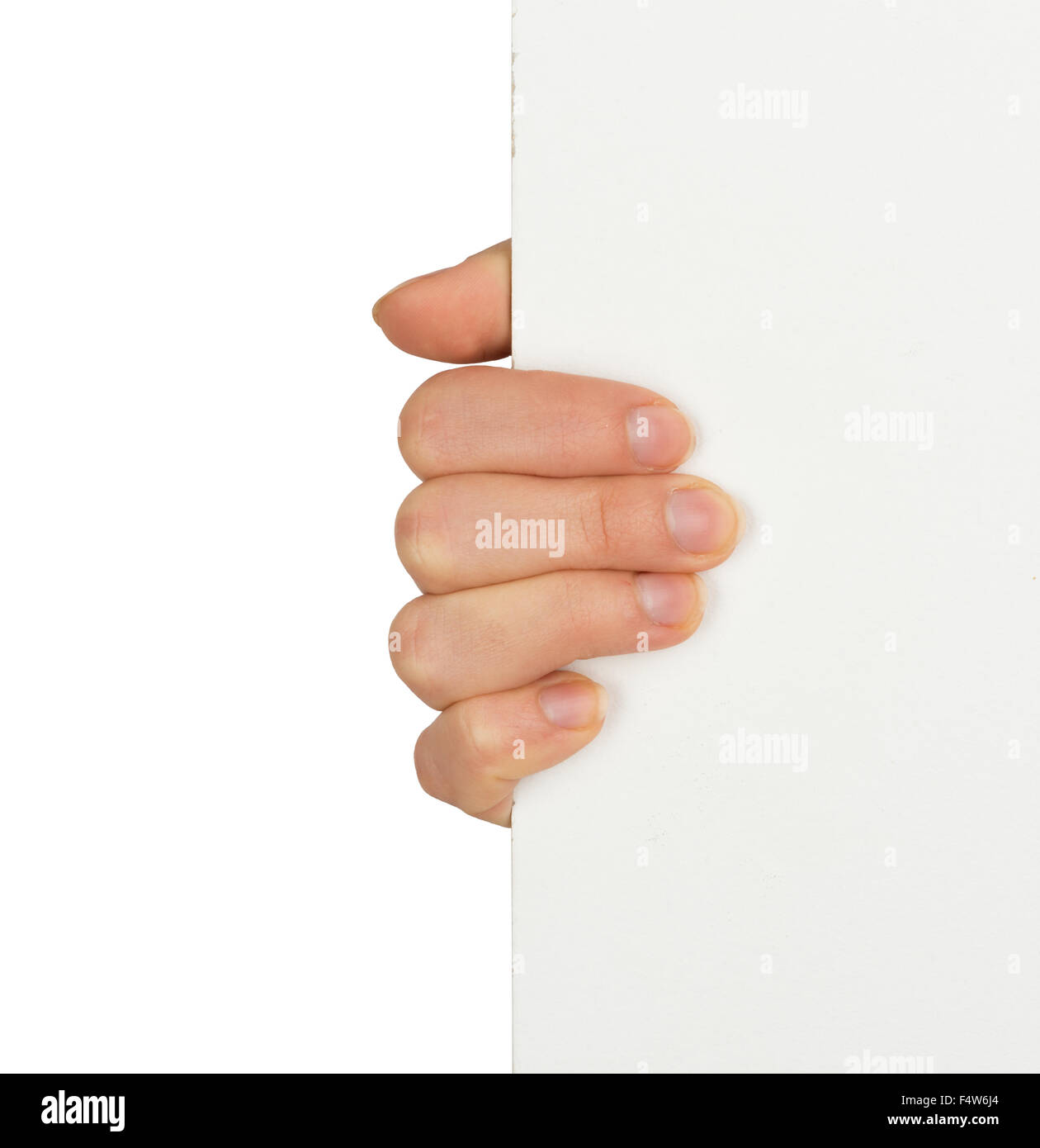 Humans hand holding edge of blank paper Stock Photo - Alamy
