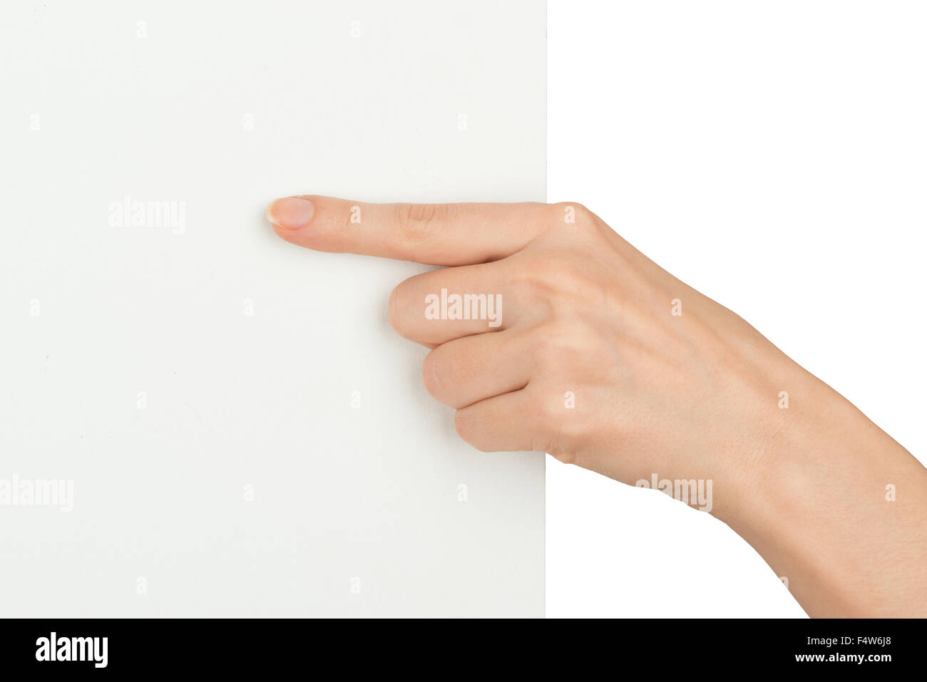 Humans hand with pointer finger holding blank card Stock Photo - Alamy