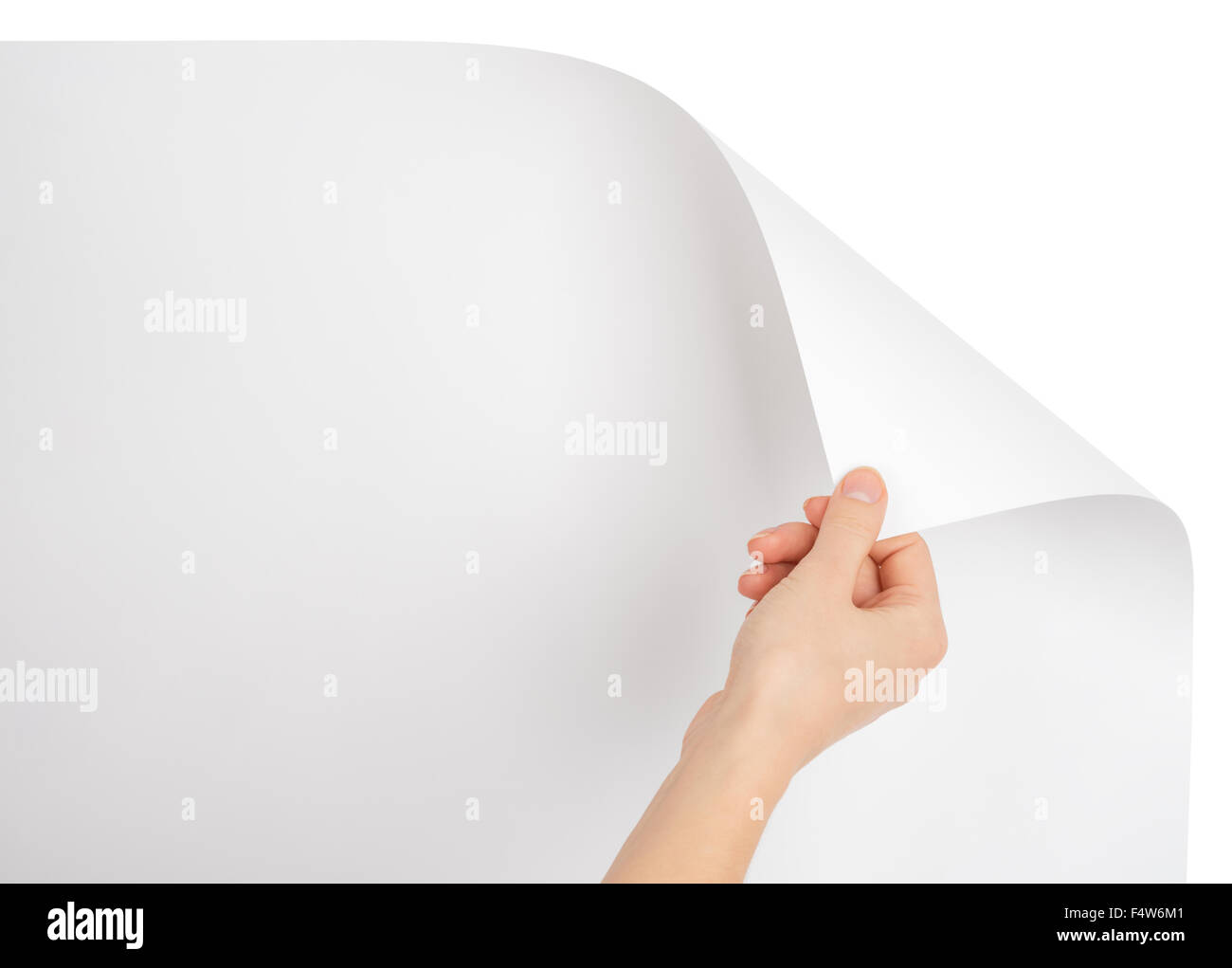 Humans hand turning upper empty page corner Stock Photo - Alamy