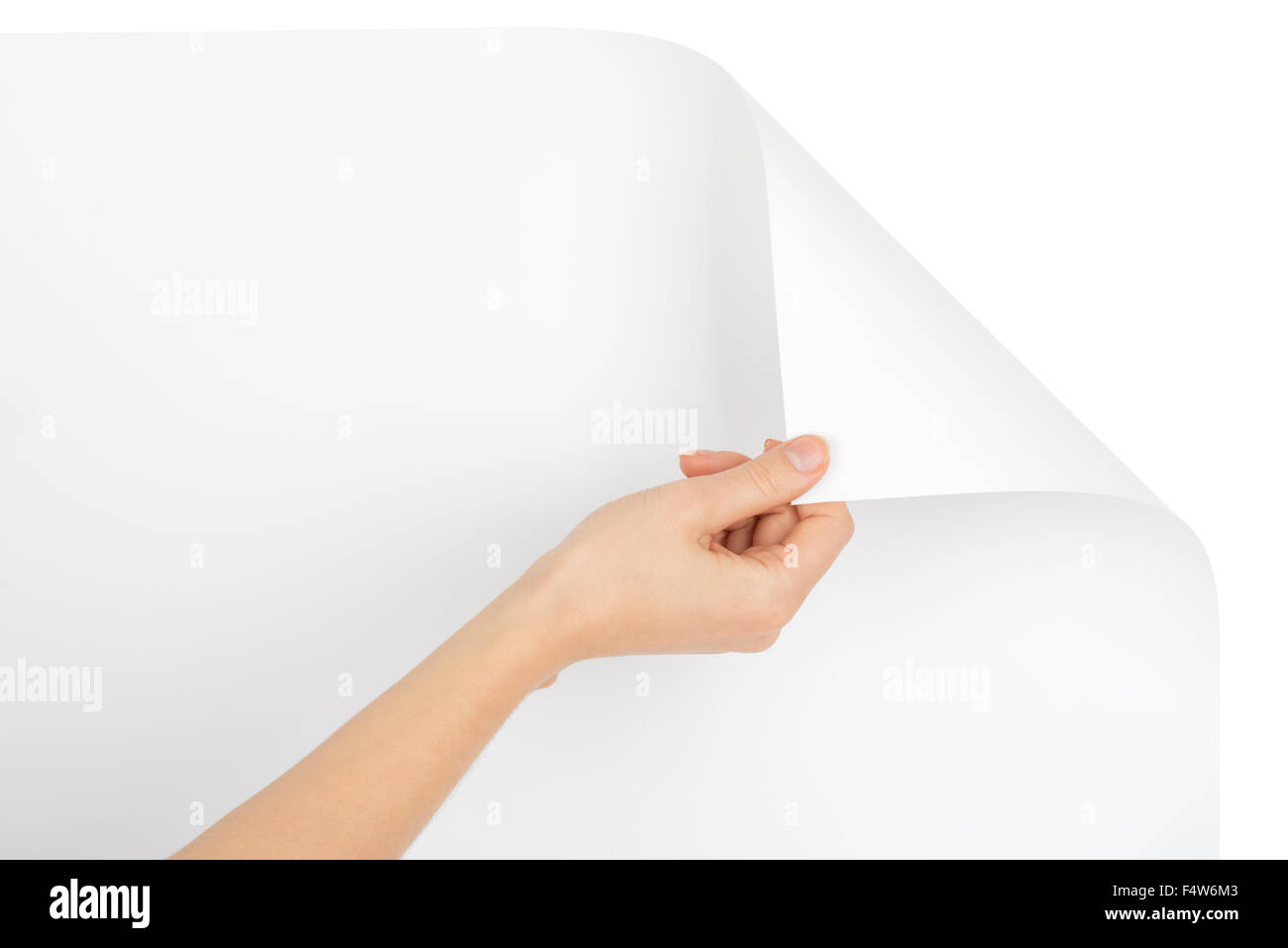 Hand turning upper right empty page corner Stock Photo - Alamy