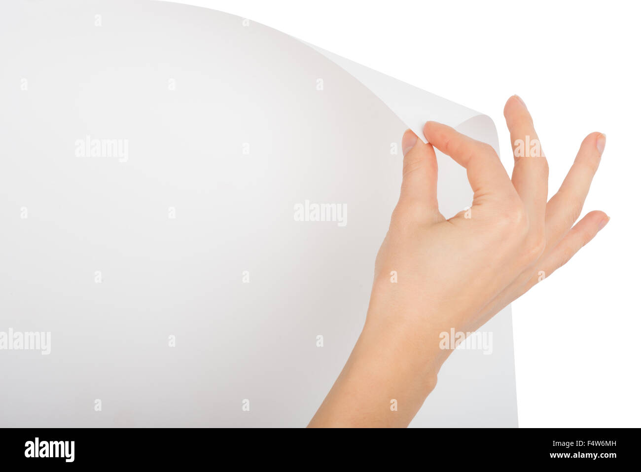 Hand turning upper right blank page corner Stock Photo - Alamy