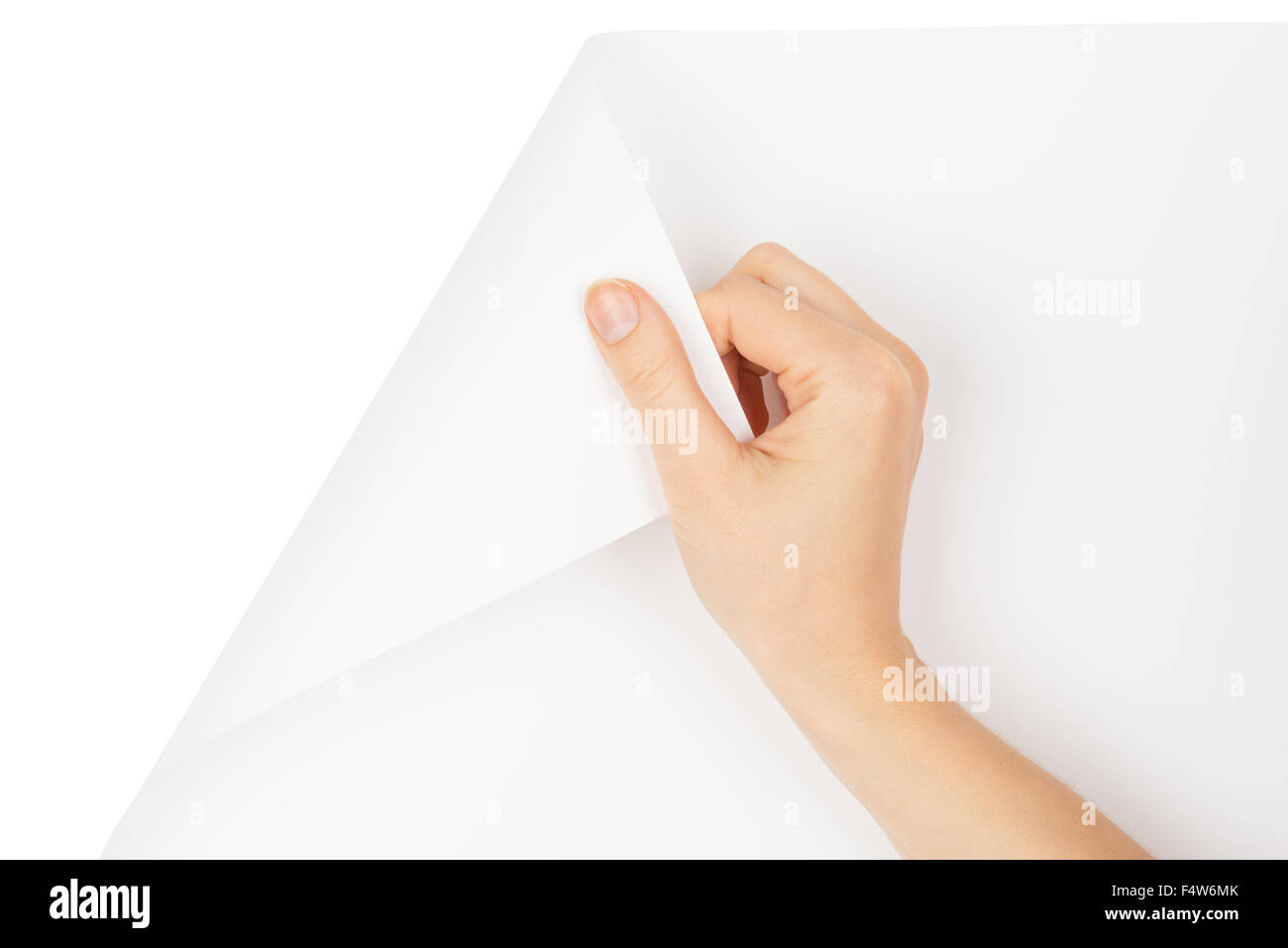 Hand turning upper left empty page corner Stock Photo - Alamy