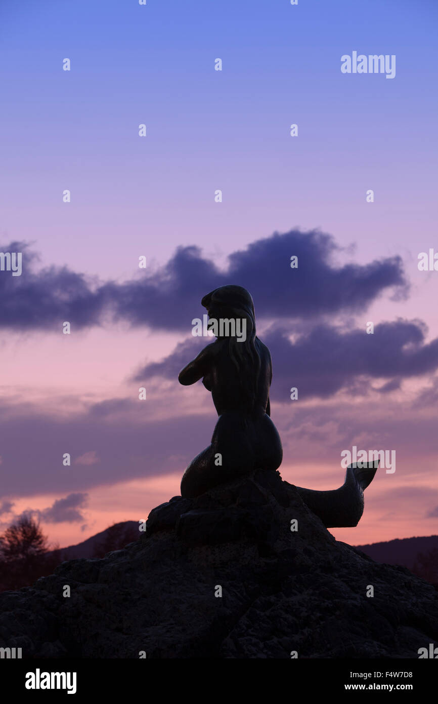 Golden mermaid statue at sunset, Songkhla ,Thailand Stock Photo - Alamy