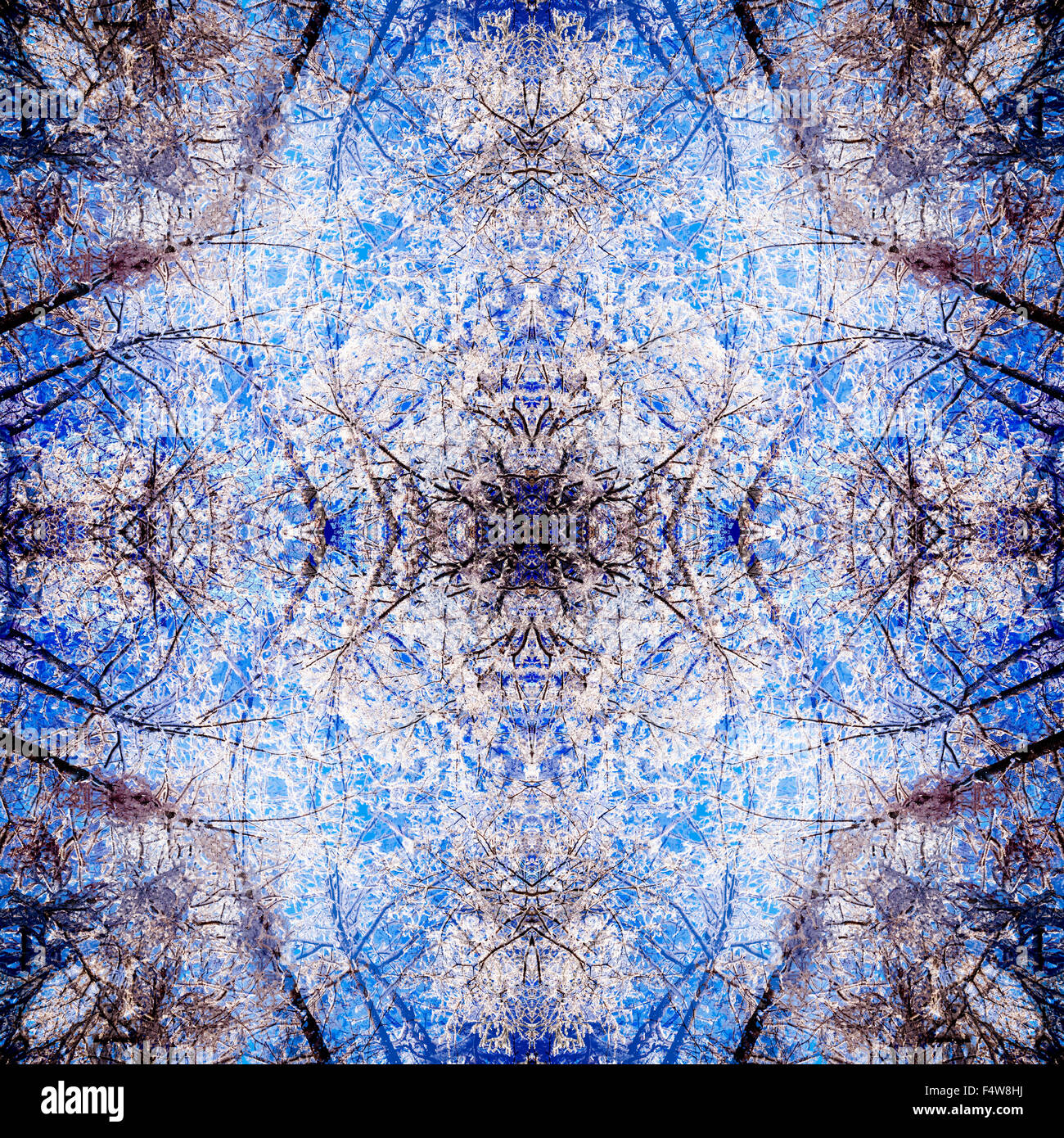 Symmetrical pattern in shades of blue, to the background or poster. The ...