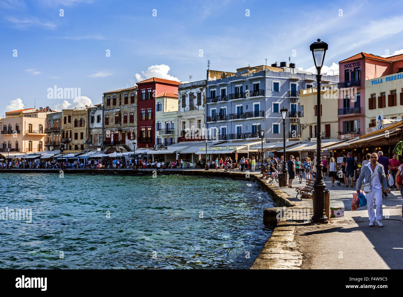 Restaurants around the harbour in the Old Venetian Port of Chania ...