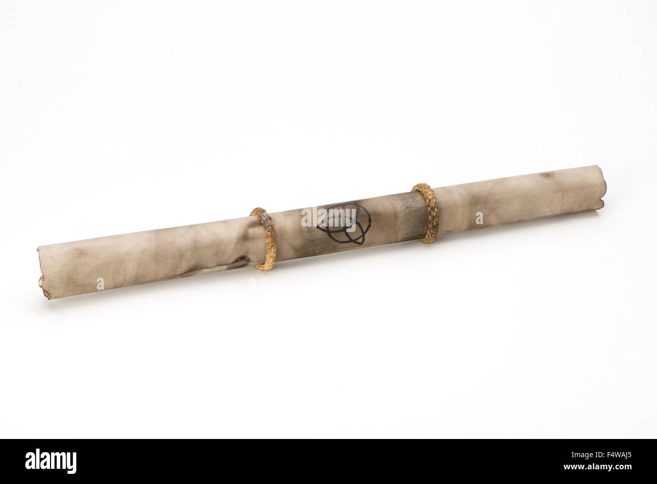 Old magic parchment isolated on white background Stock Photo - Alamy