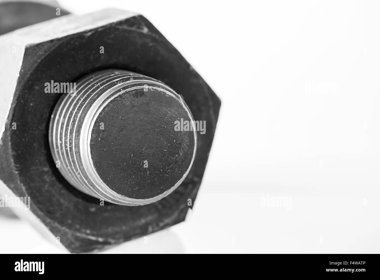 Close up of the grey bolt on white background Stock Photo - Alamy