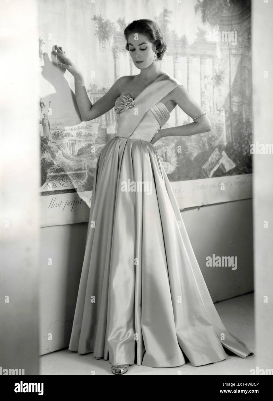 A model presents an evening outfit by British designer Michael Sherard ...