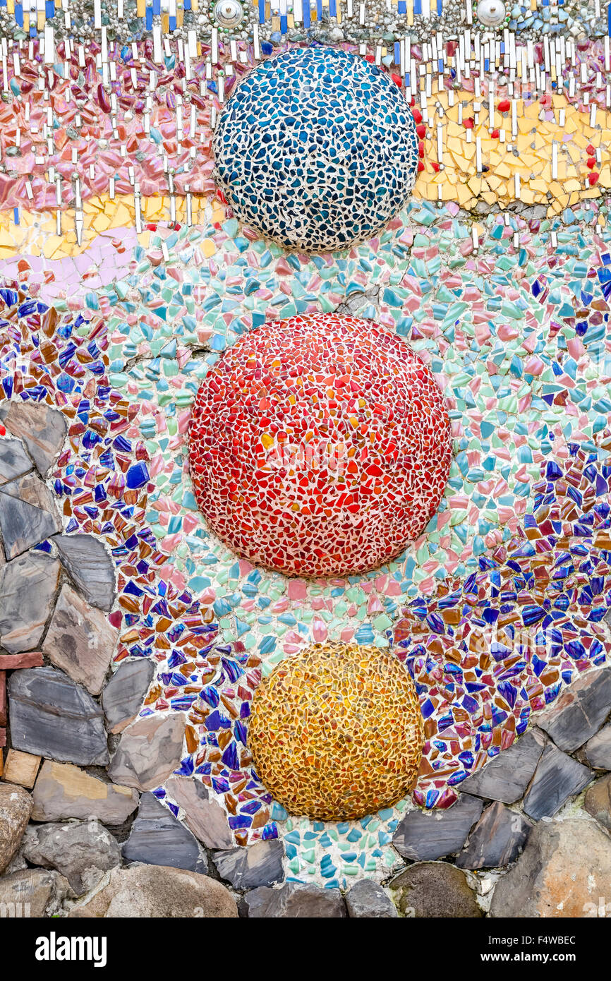 on this wall there are small pieces of tiles Stock Photo - Alamy