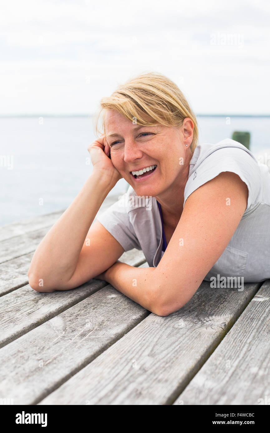 Woman lying on hi-res stock photography and images - Alamy