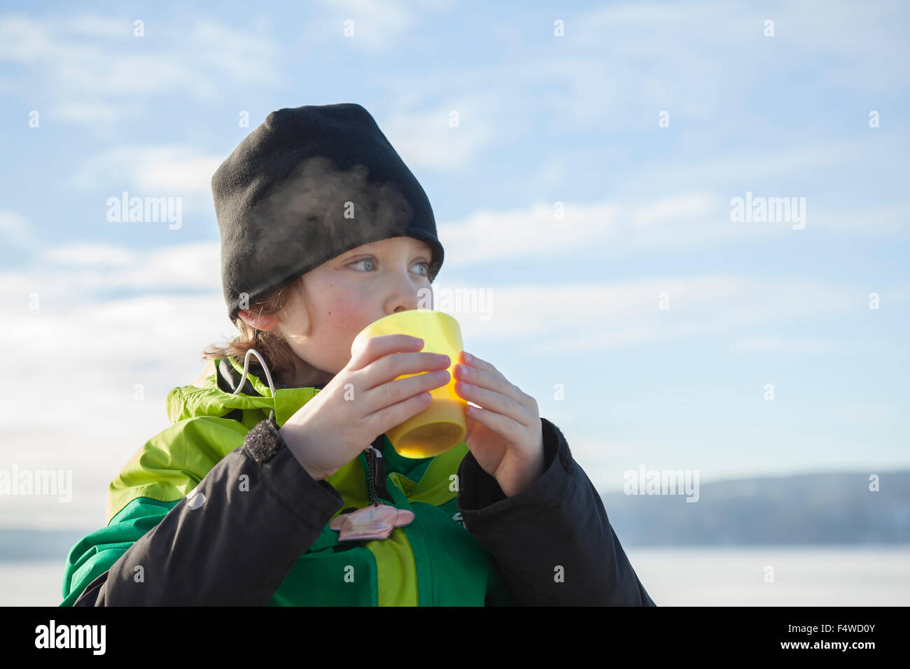 Boy drinking a cup of tea hi-res stock photography and images - Alamy
