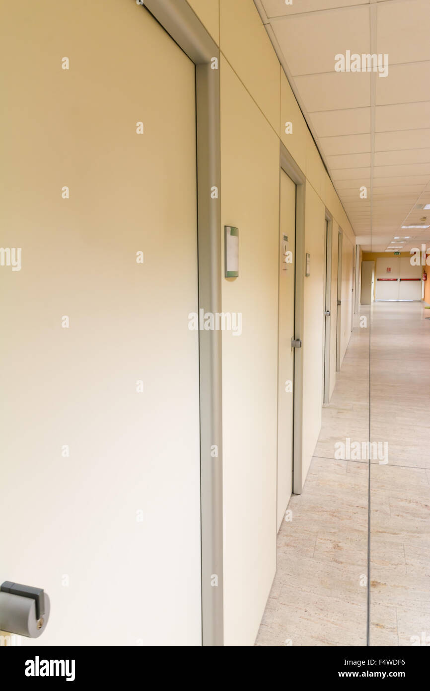 beige hospital hallway; empty hospital corridor; hospital interior ...