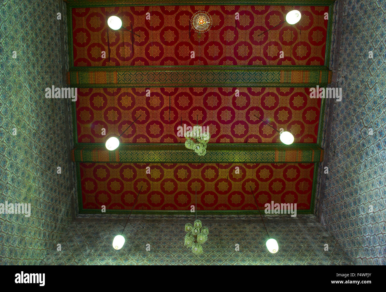 Thai pattern on ceiling temple and light Stock Photo - Alamy