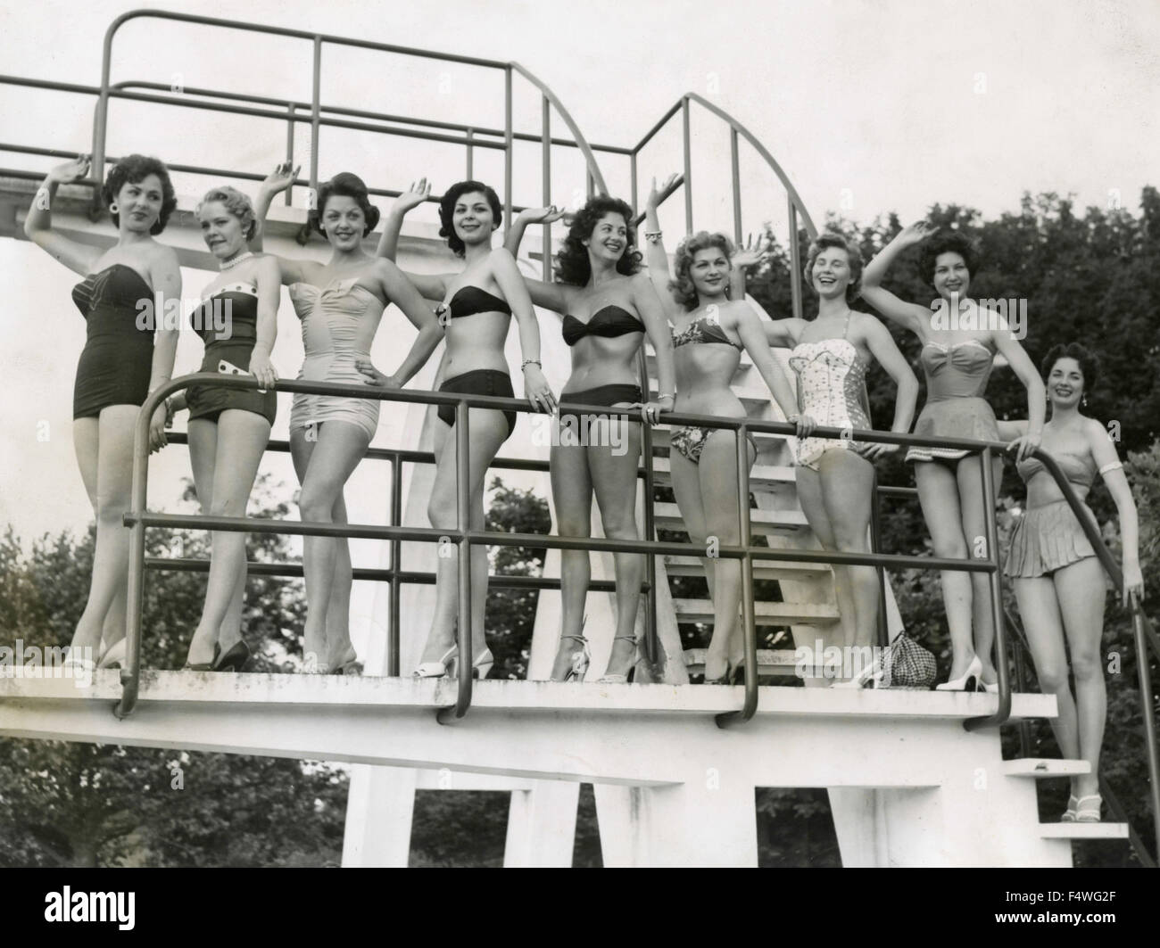 Miss parade in a swimsuit on the pool deck, Italy Stock Photo - Alamy