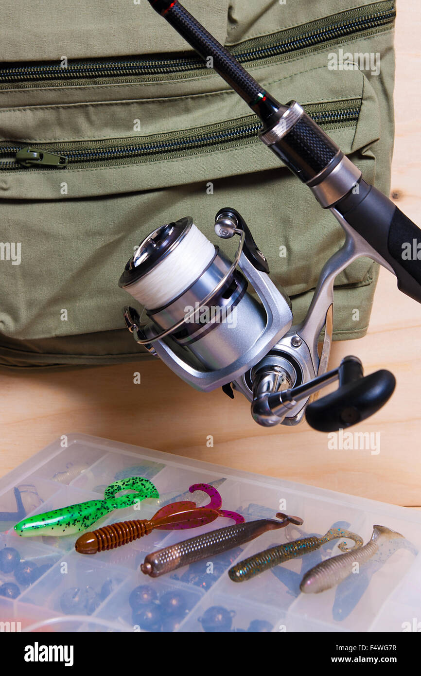 Fishing rod and reel with silicone baits. Fishing silicone lures on the ...
