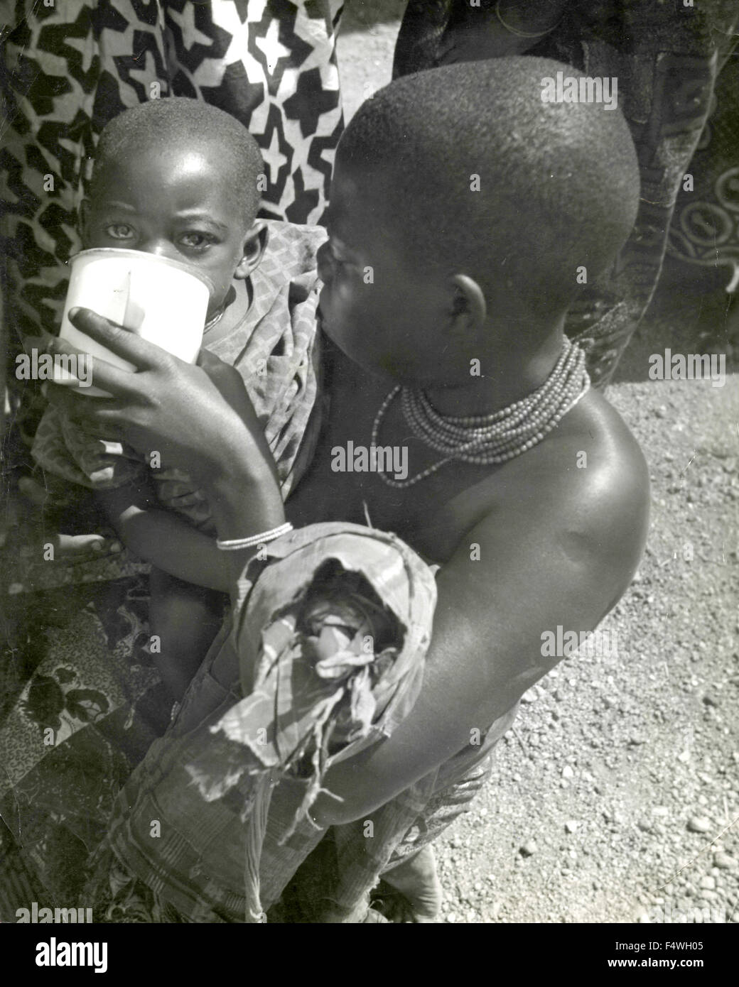 An African woman suckled her baby Stock Photo - Alamy