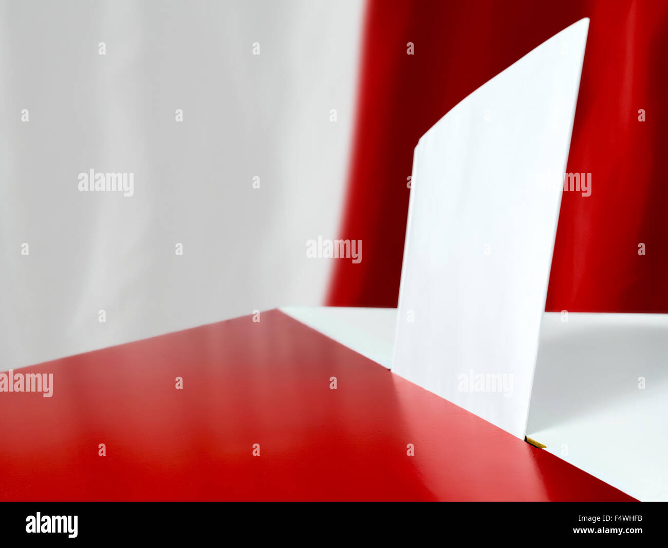 Voting card in the ballot box against Polish flag as background Stock ...