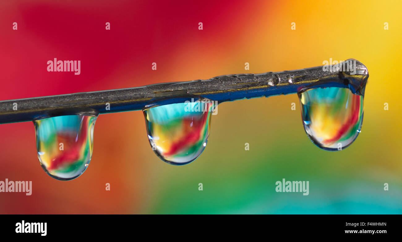 Rainbow coloured water droplets Stock Photo - Alamy