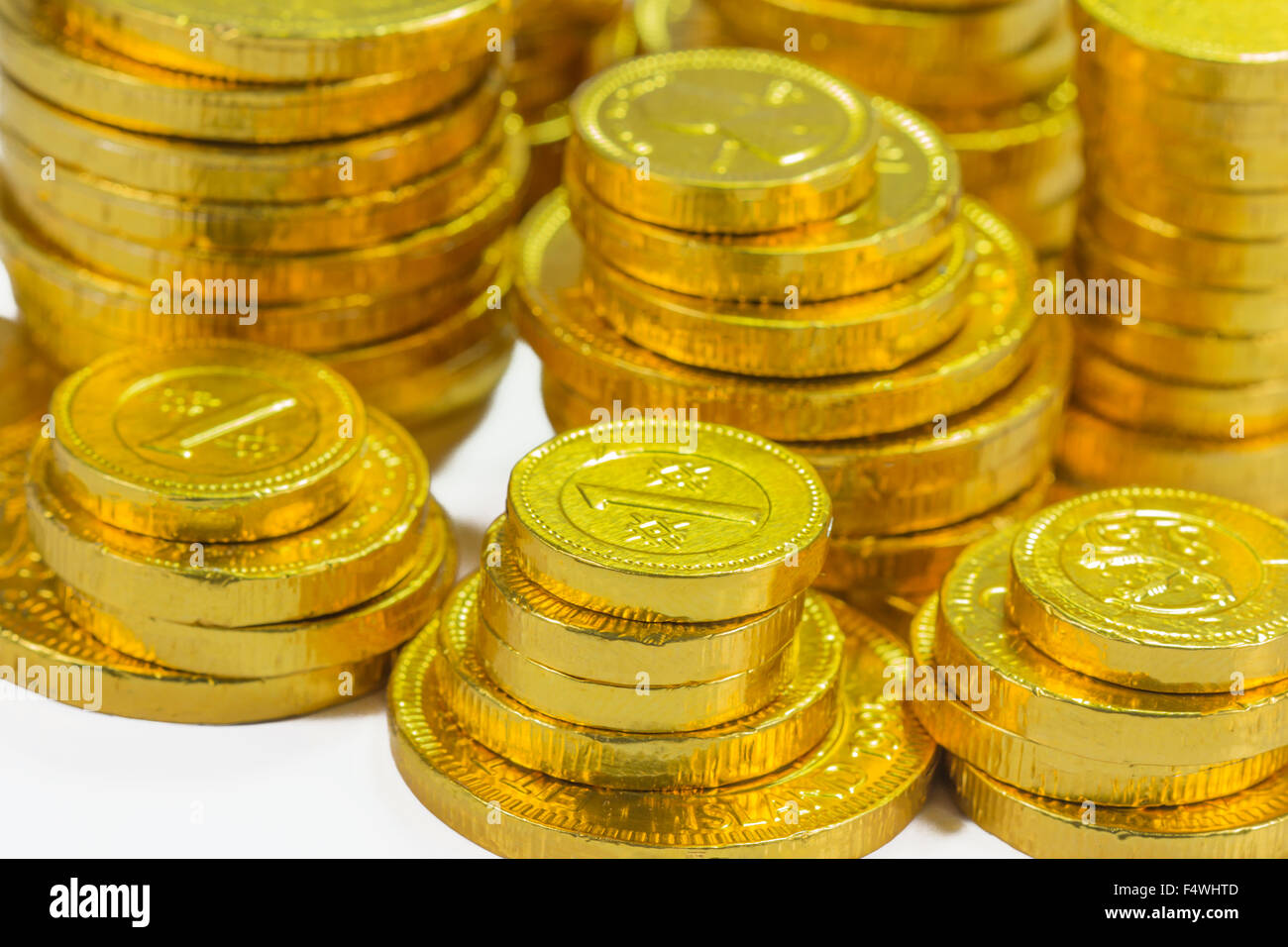 Group of gold coins business money Stock Photo - Alamy