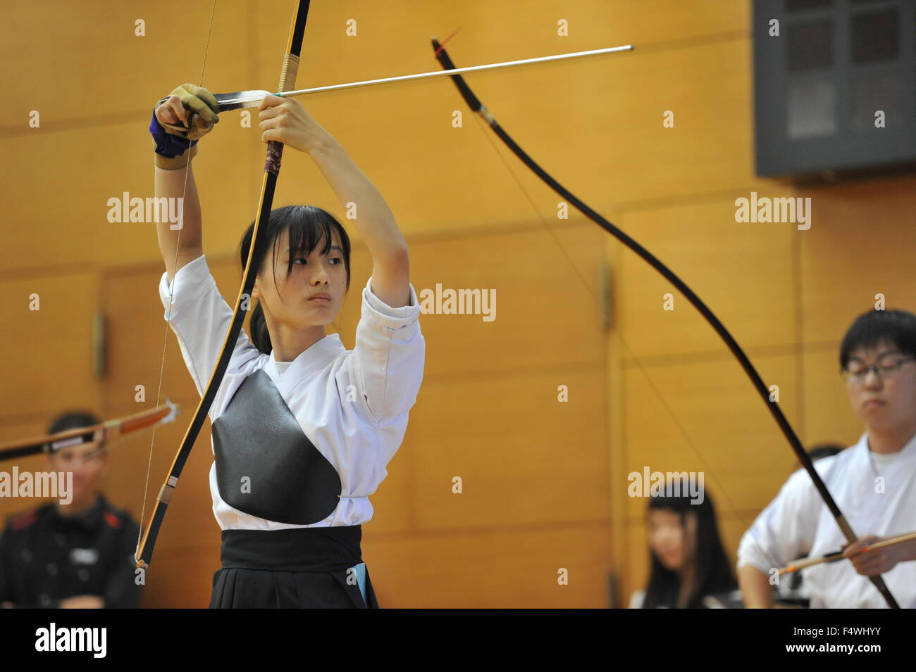 Students from Urawa Municipal High School Kyudo Club demonstrate ...
