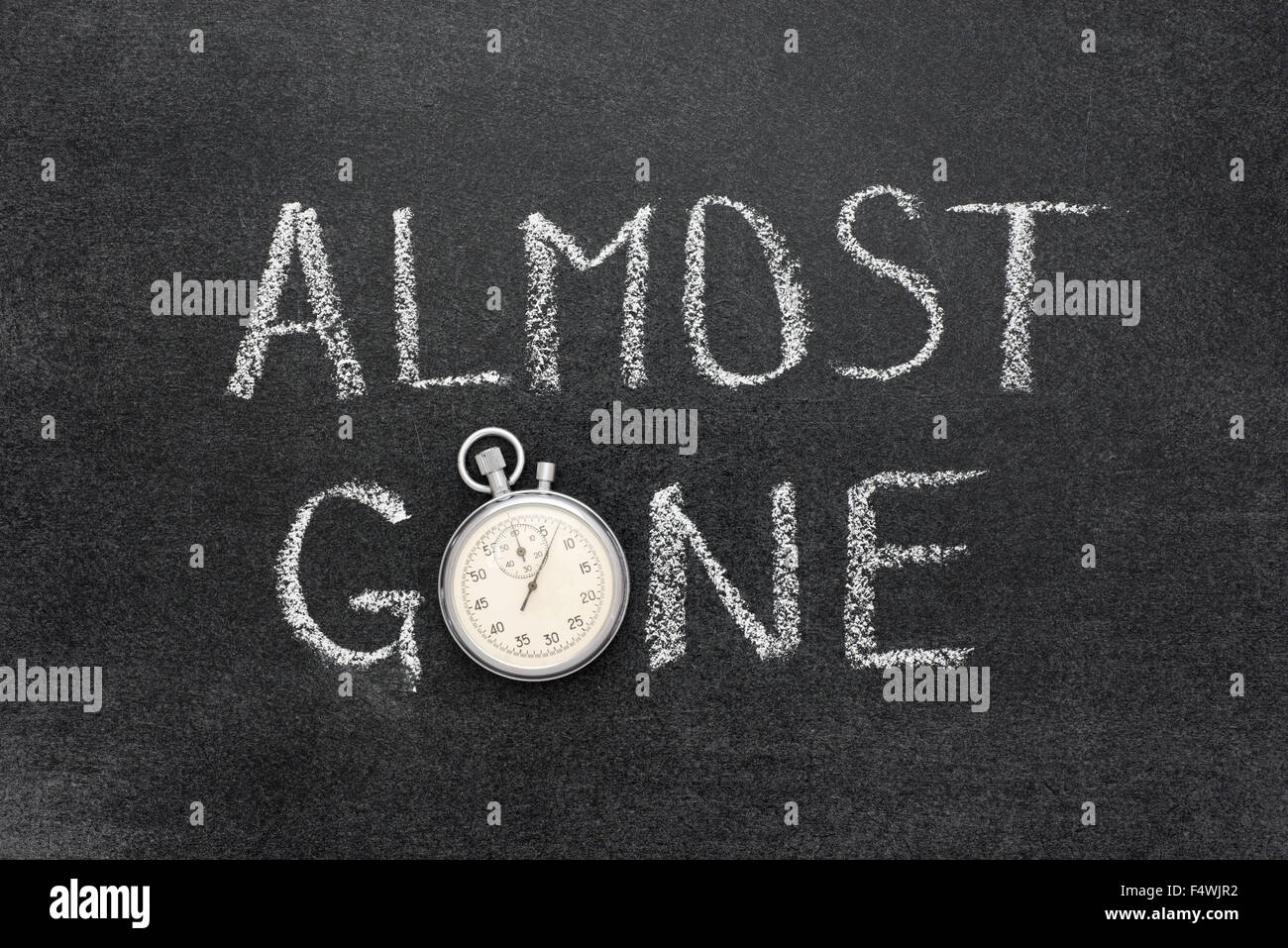 almost gone phrase handwritten on chalkboard with vintage precise ...