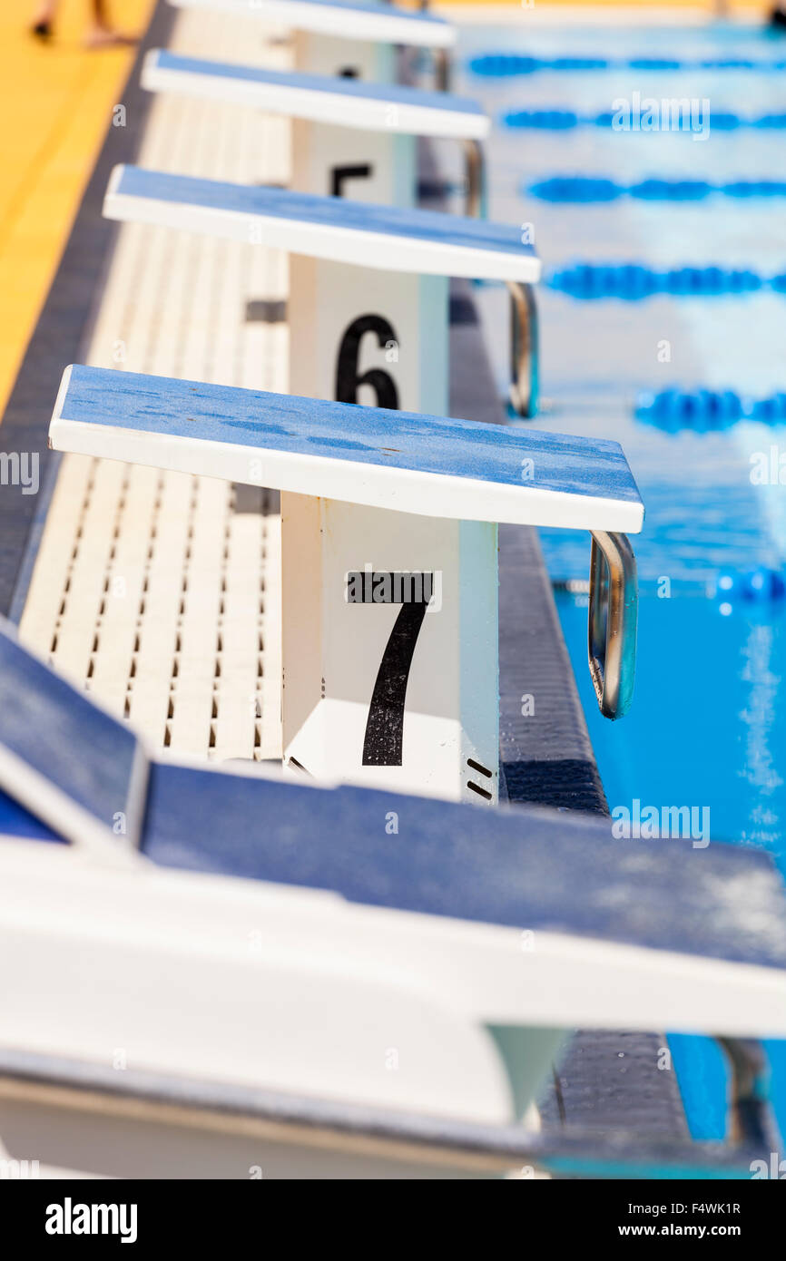 Starting platforms at a swimming pool Stock Photo - Alamy