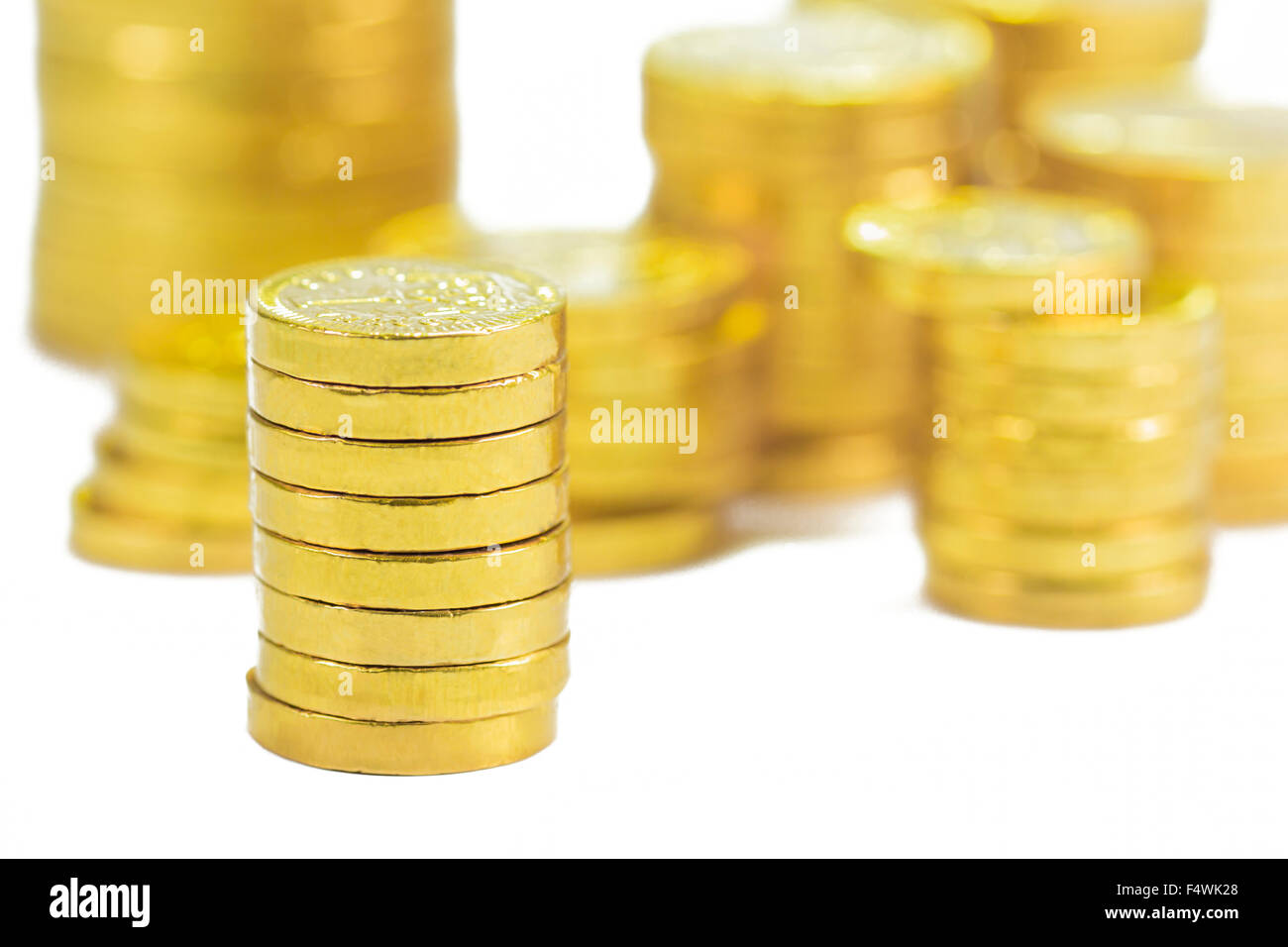 Group of gold coins business money Stock Photo - Alamy