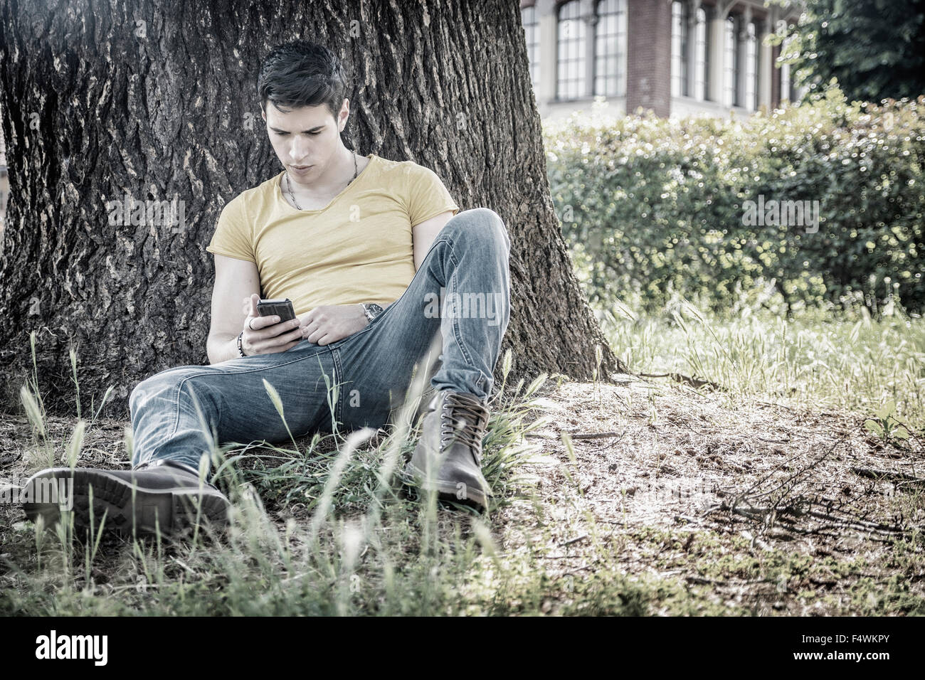 Resting Against Tree High Resolution Stock Photography and Images - Alamy