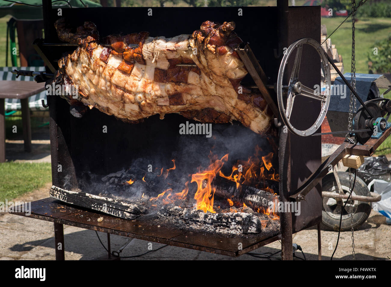 Piglet roasted on a spit Stock Photo - Alamy