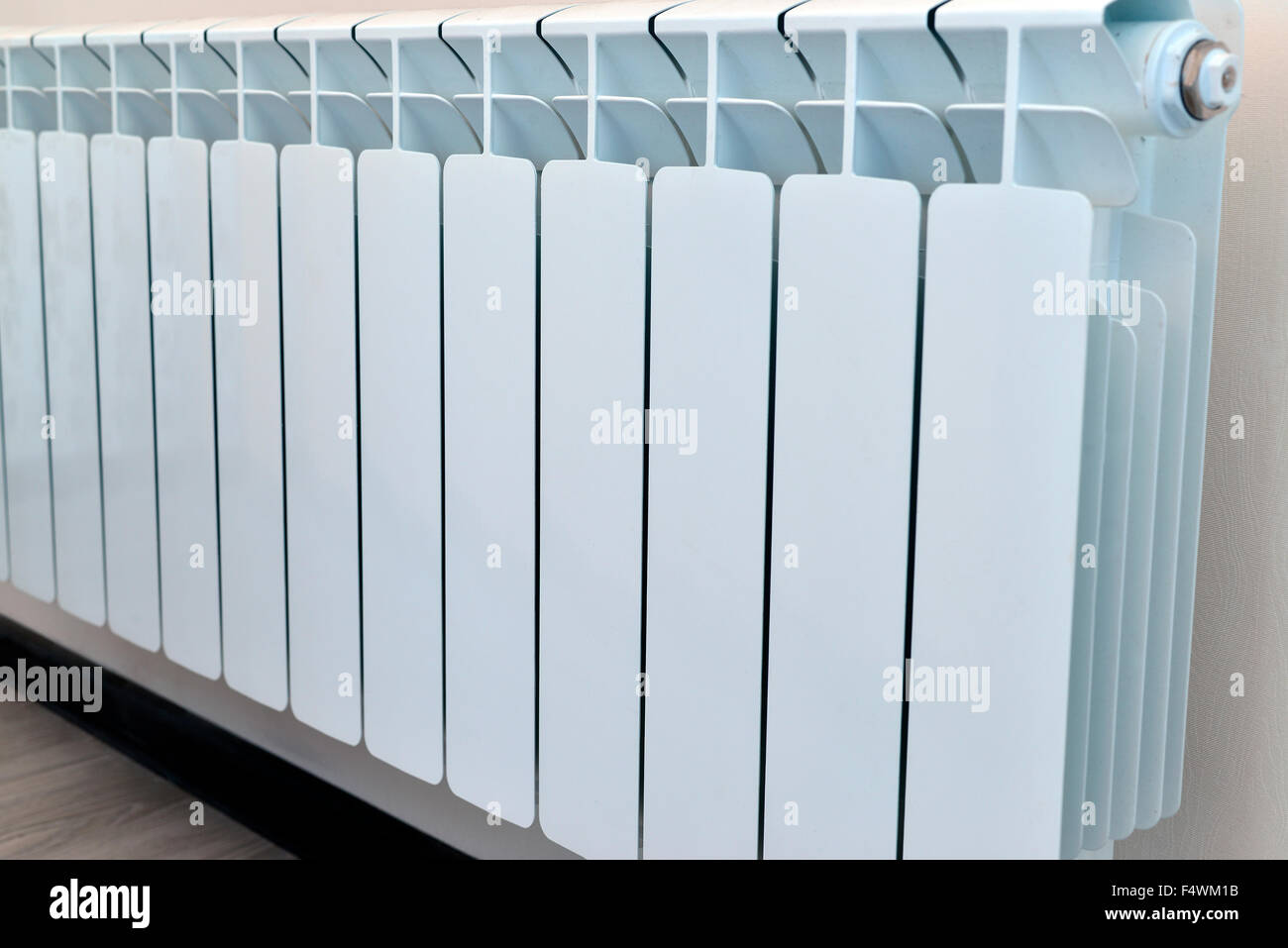 White heating radiator on the wall Stock Photo - Alamy