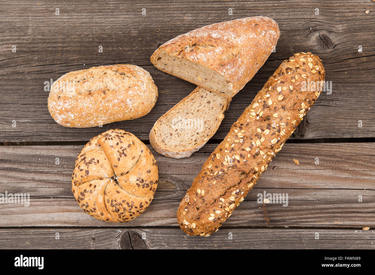 Background of fresh bread and bakery on an old vintage planked wood ...