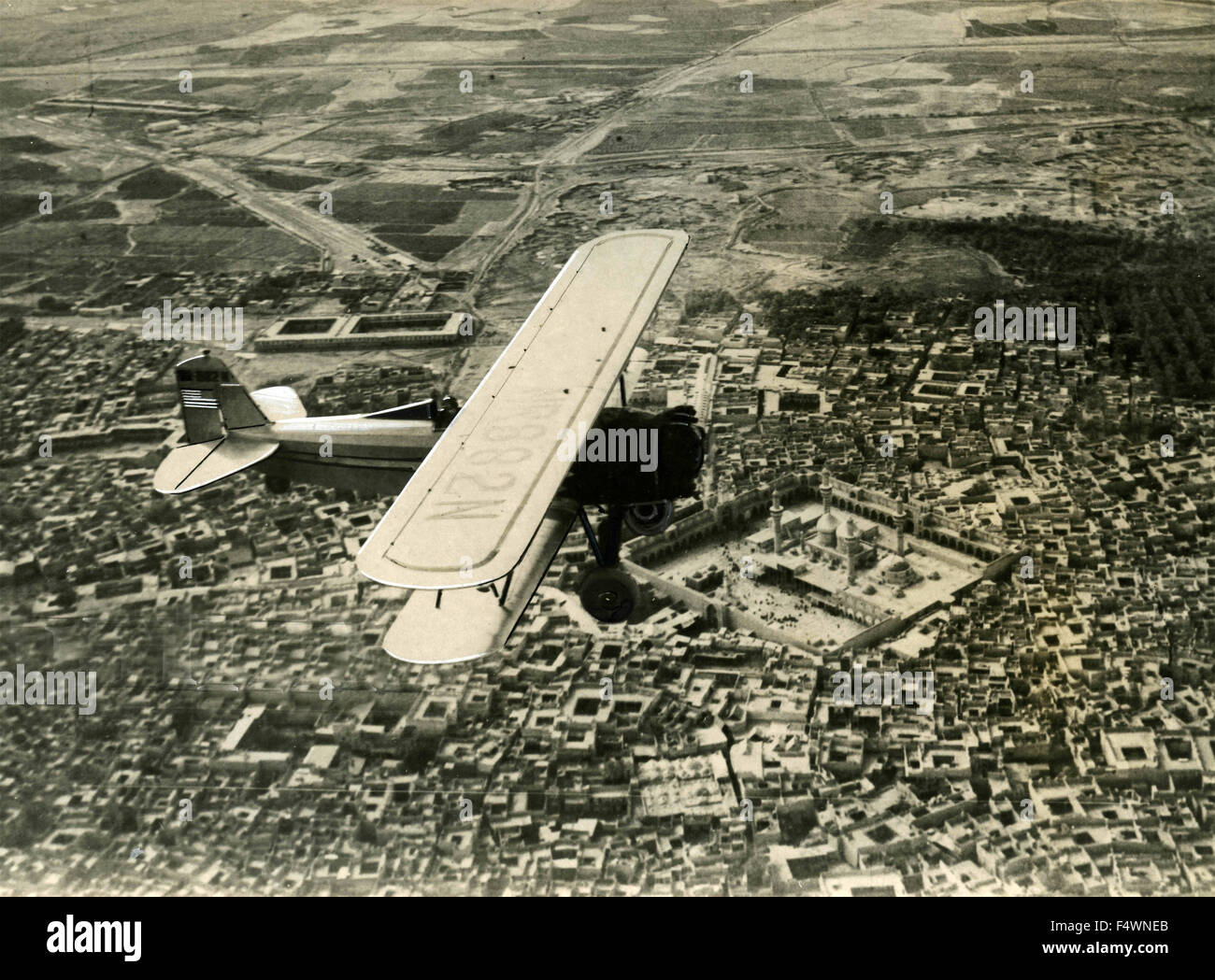 The plane Flying Carpet of Richard Halliburton flies over the Kadhimain ...