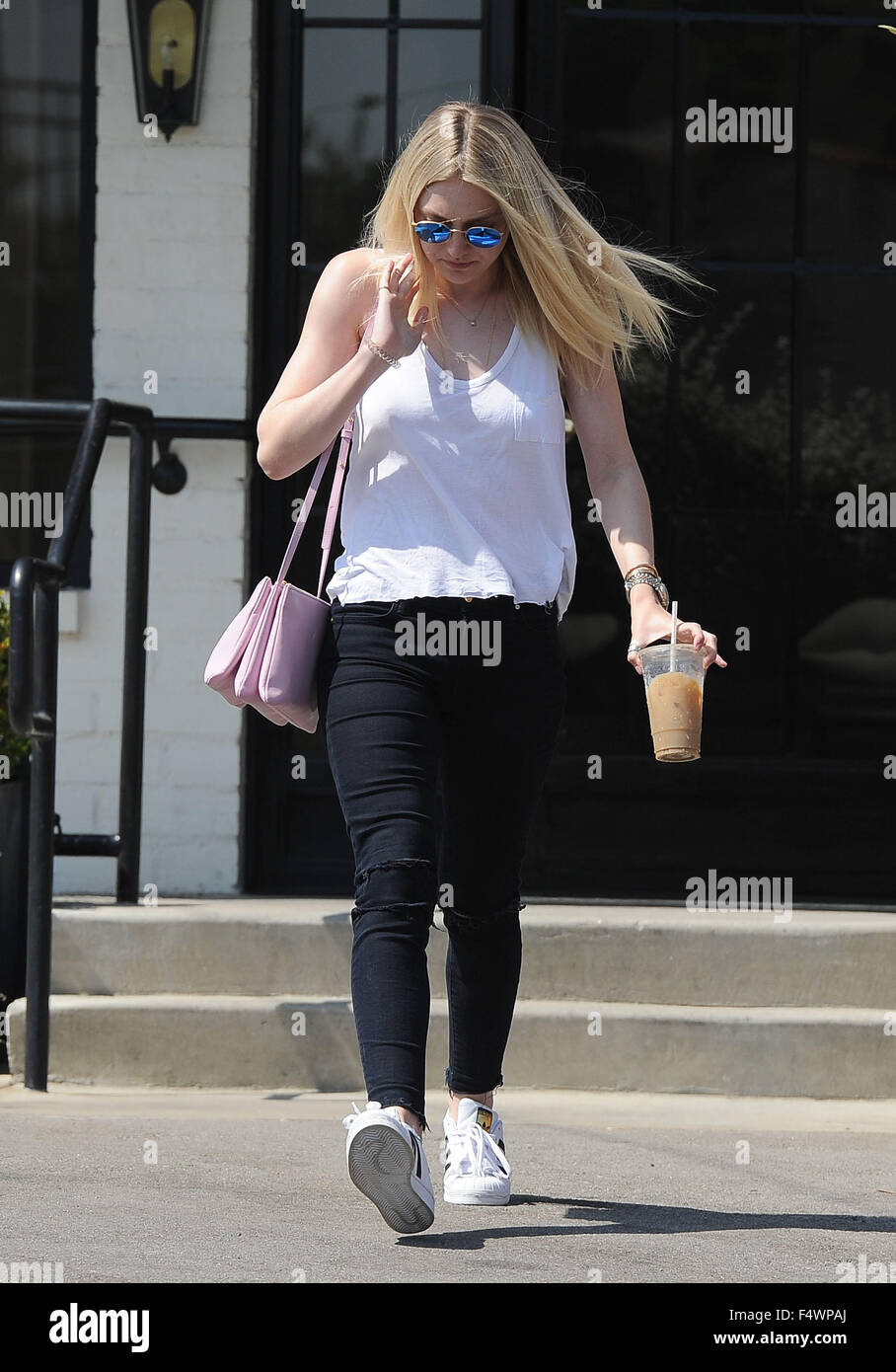 Dakota Fanning leaves Ramirez Tran salon sporting a nice new pair of ...