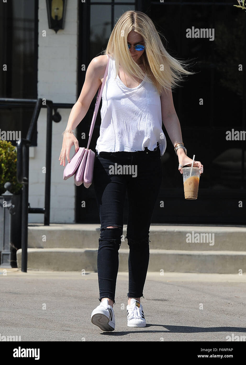 Dakota Fanning leaves Ramirez Tran salon sporting a nice new pair of ...