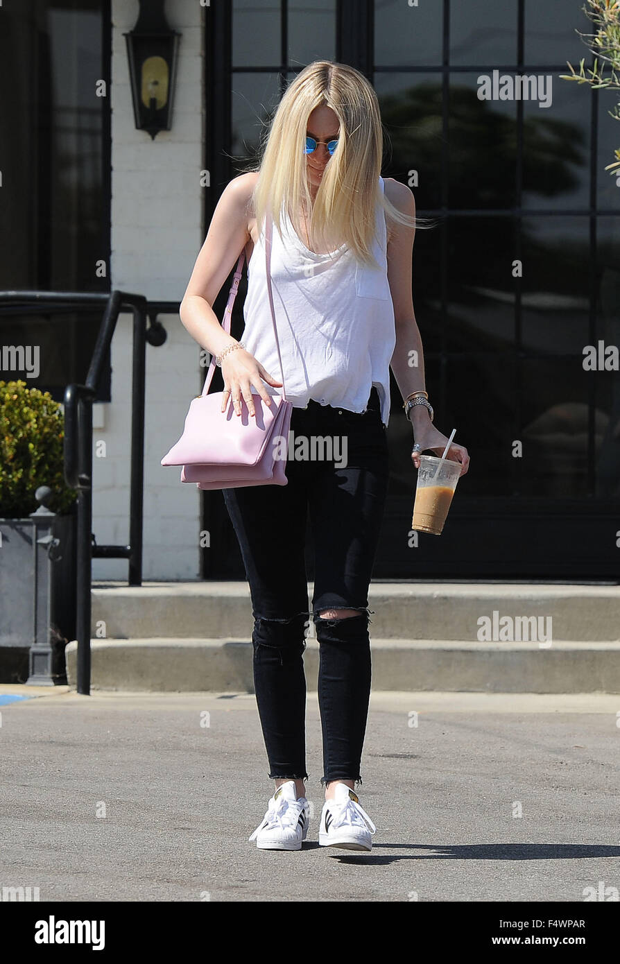 Dakota Fanning leaves Ramirez Tran salon sporting a nice new pair of ...