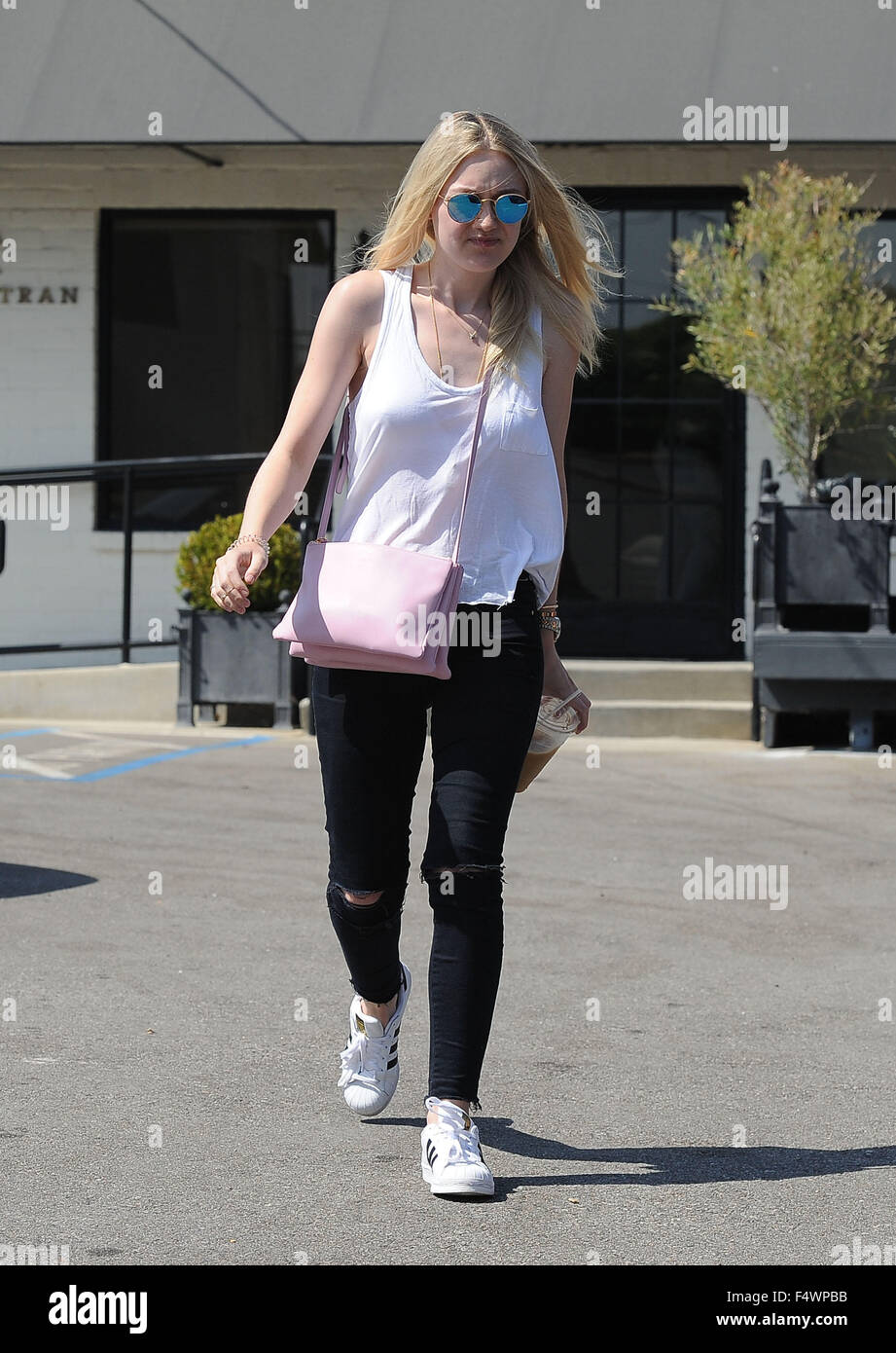 Dakota Fanning leaves Ramirez Tran salon sporting a nice new pair of ...