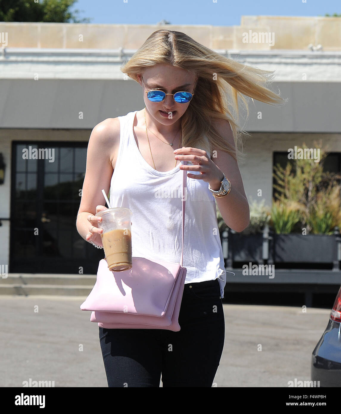 Dakota Fanning leaves Ramirez Tran salon sporting a nice new pair of ...