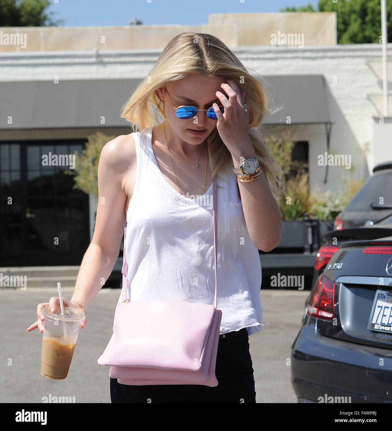 Dakota Fanning leaves Ramirez Tran salon sporting a nice new pair of ...