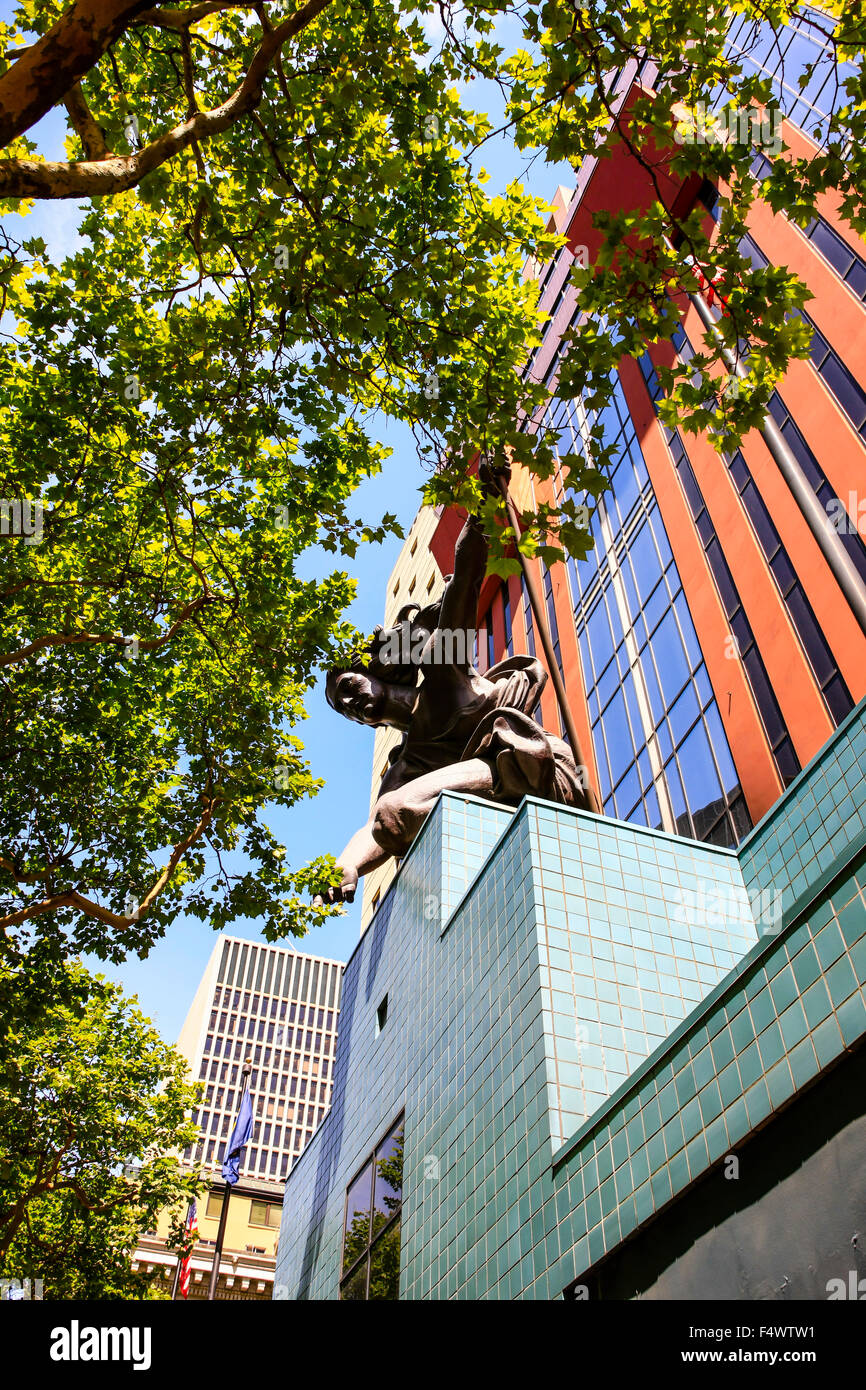 Bronze statue over the doorway of the Portland building on 5th Avenue ...